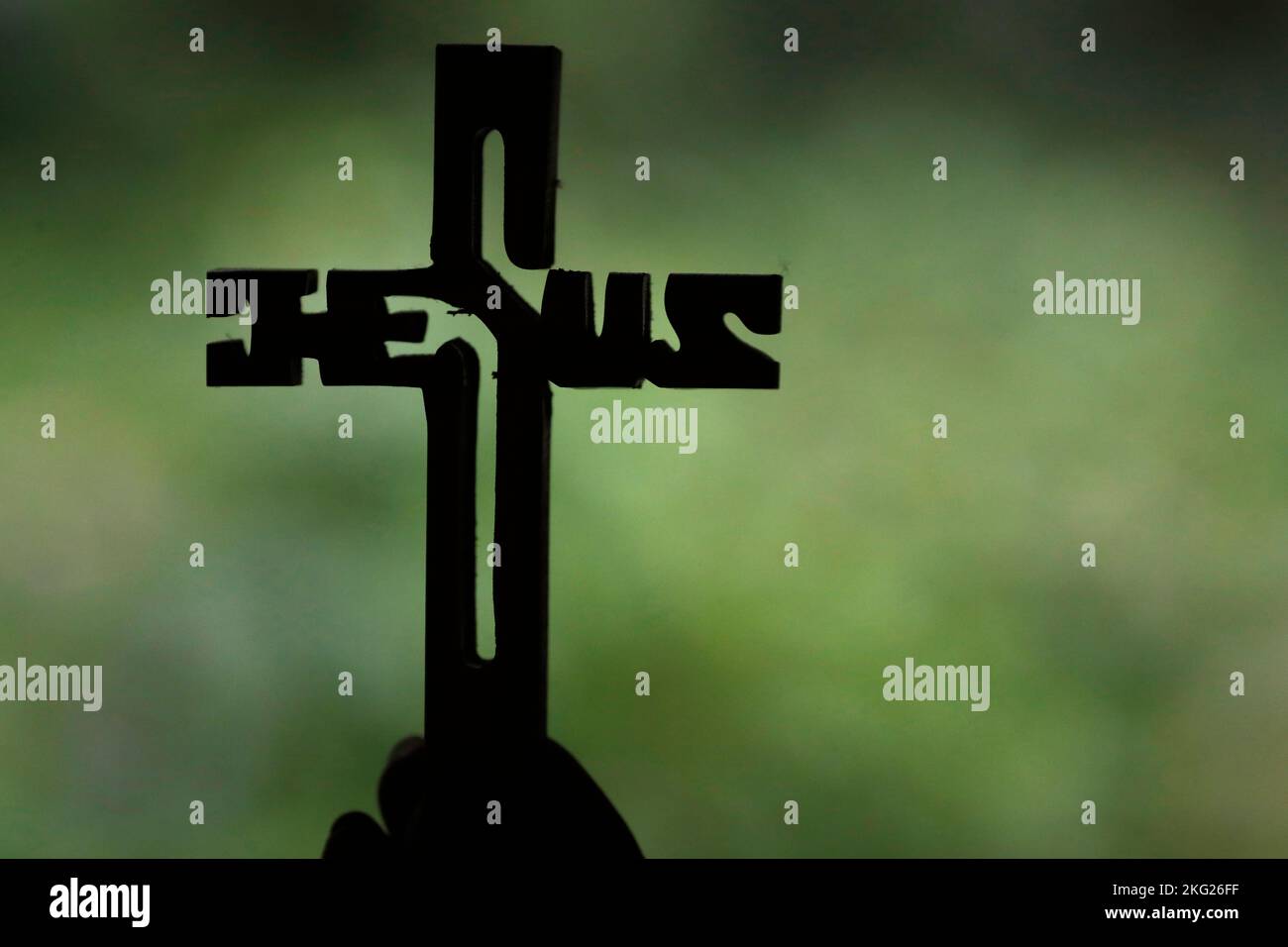 Holy bible and christian cross with the name of jesus. Faith and ...