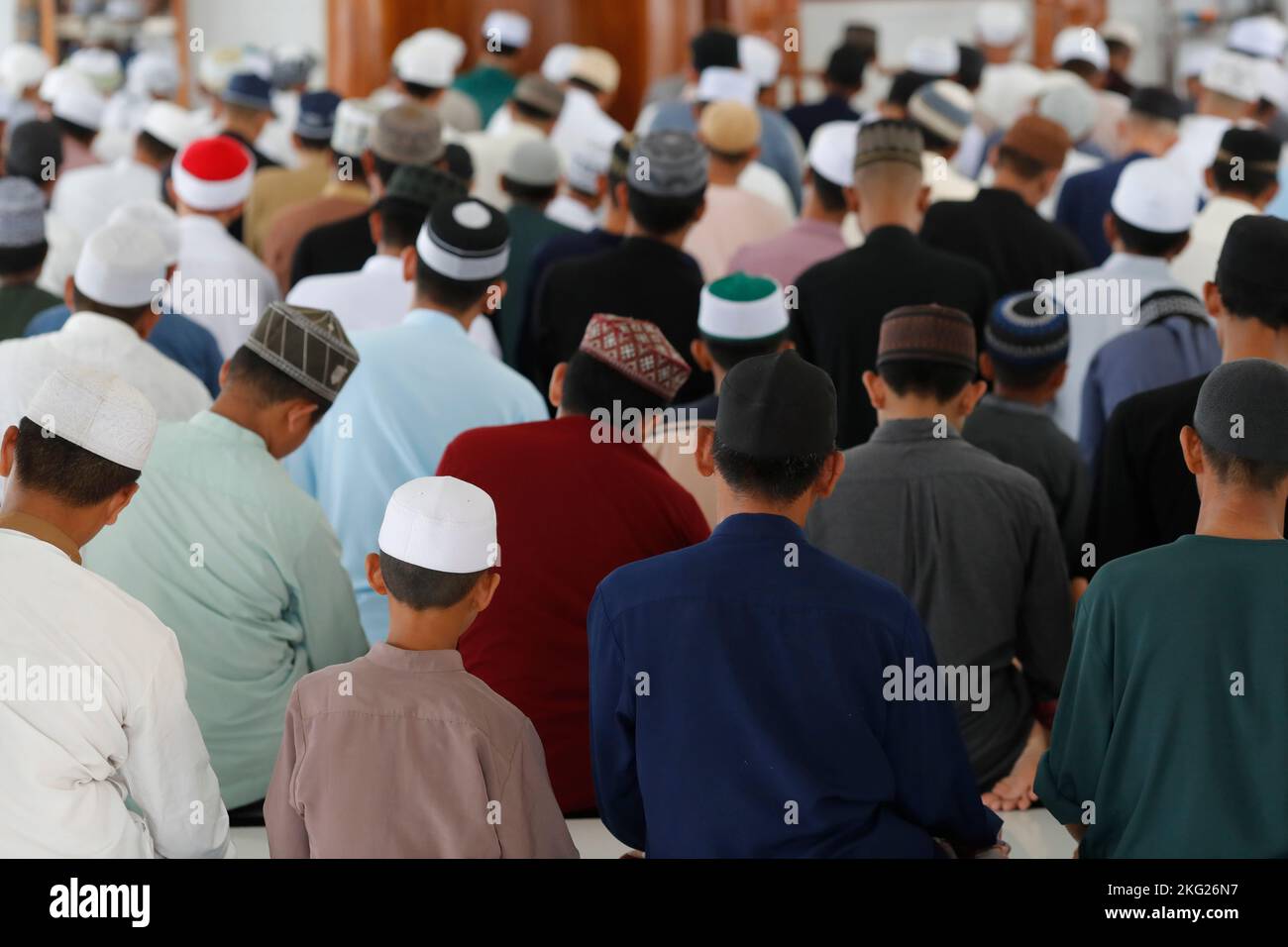 The friday prayer (salat). Muslim men praying in mosque. Chau Doc ...