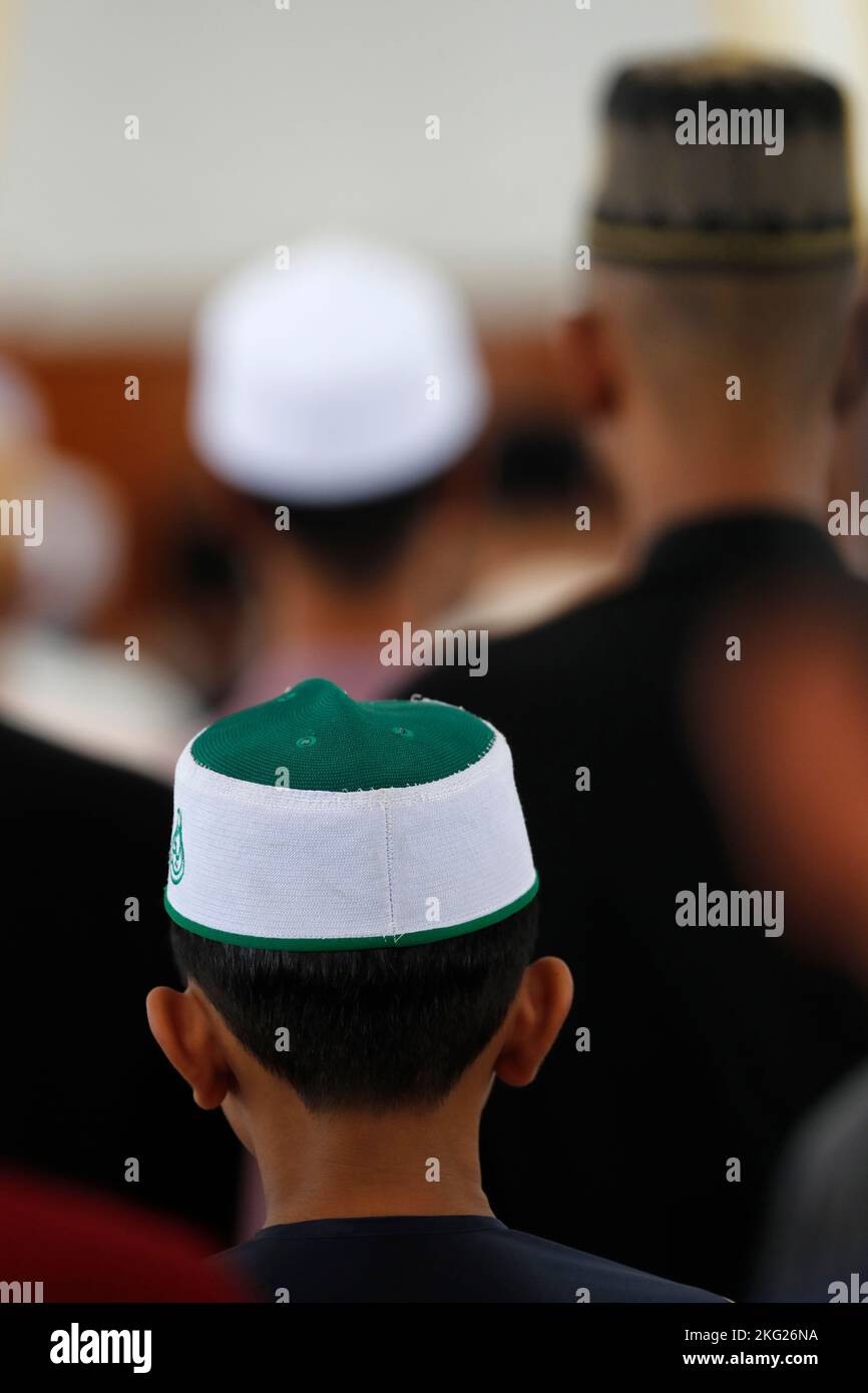 The friday prayer (salat). Muslim men praying in mosque. Chau Doc ...