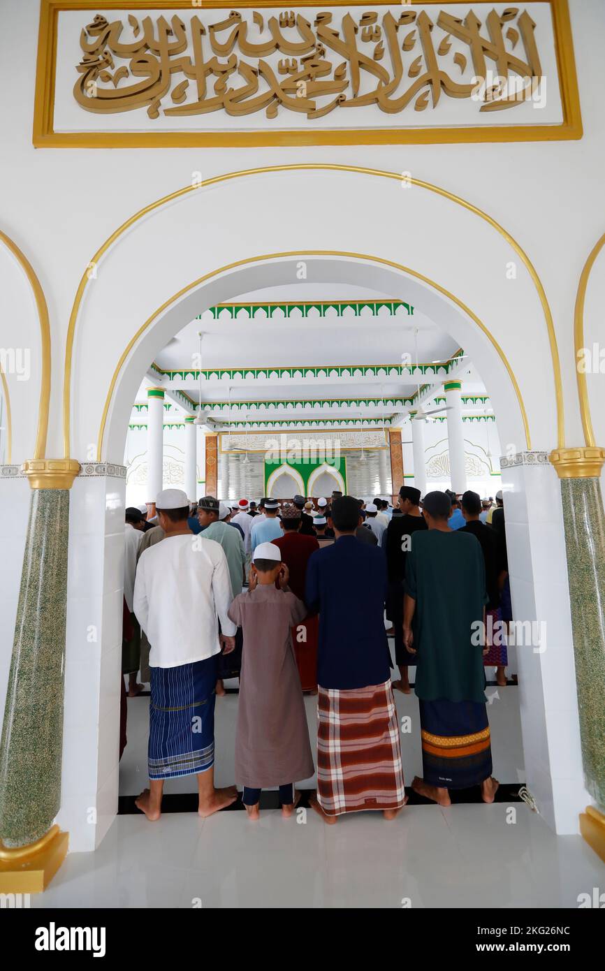 The friday prayer (salat). Muslim men praying in mosque. Chau Doc ...