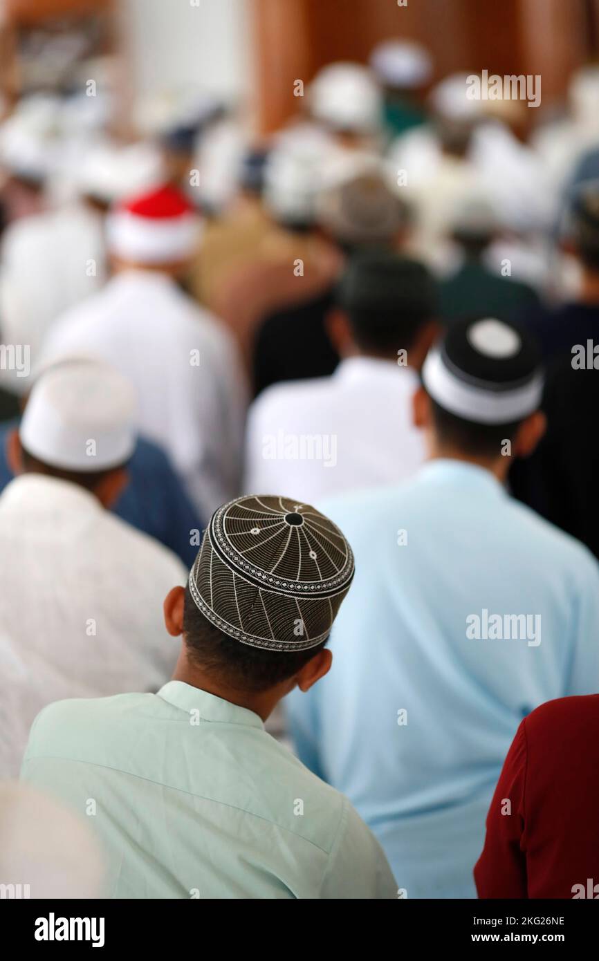 The friday prayer (salat). Muslim men praying in mosque. Chau Doc ...