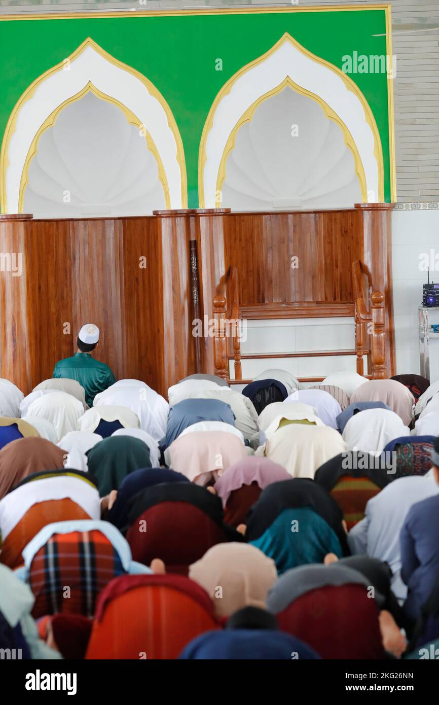 The friday prayer (salat). Muslim men praying in mosque. Chau Doc ...