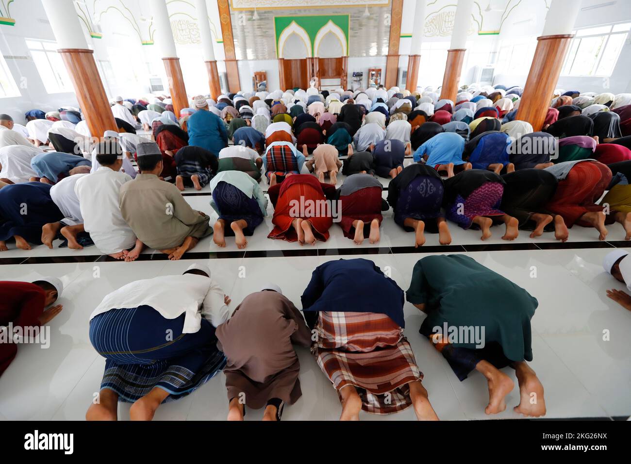 The friday prayer (salat). Muslim men praying in mosque. Chau Doc ...