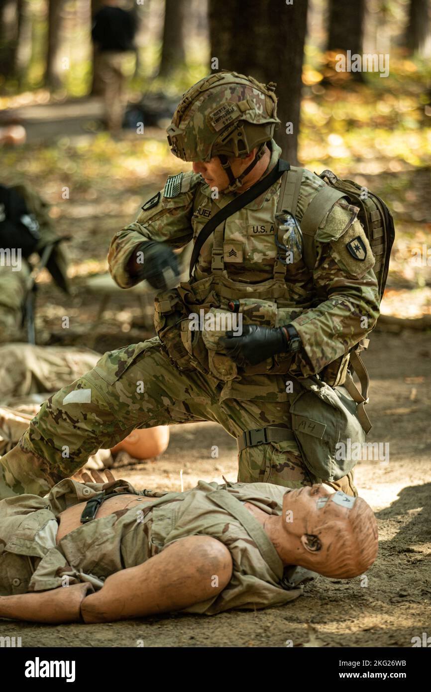 A competitor with the 44th Medical Brigade drags a simulated casualty ...