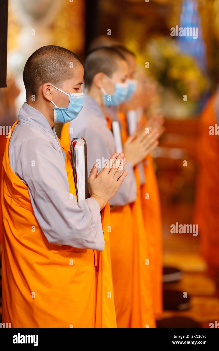 Ba Vang buddhist temple. Nuns at religious rituals. Buddhist ceremony ...