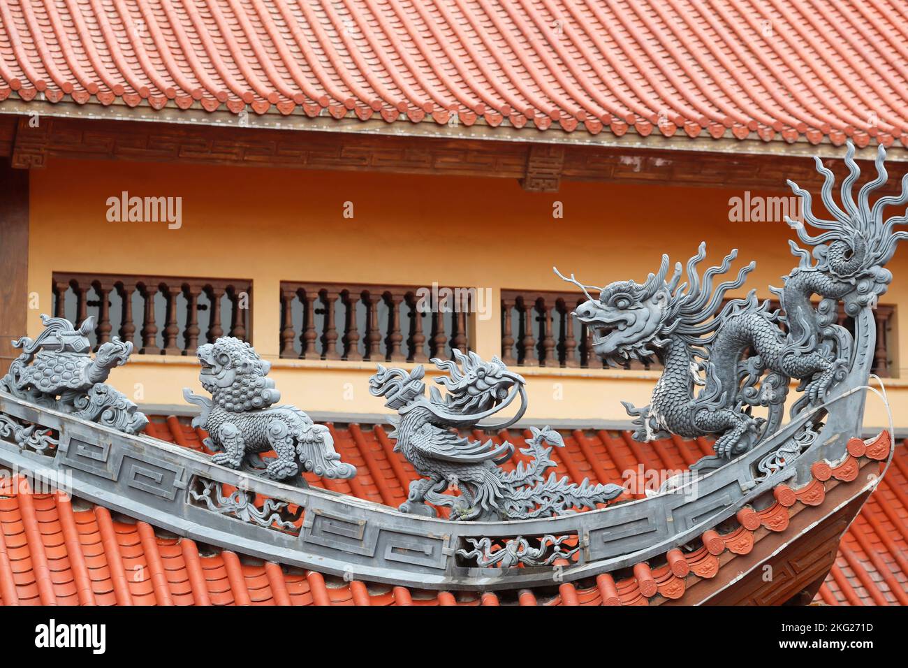 Ba Vang buddhist temple. Dragon statue on temple roof Uong Bi. Vietnam ...