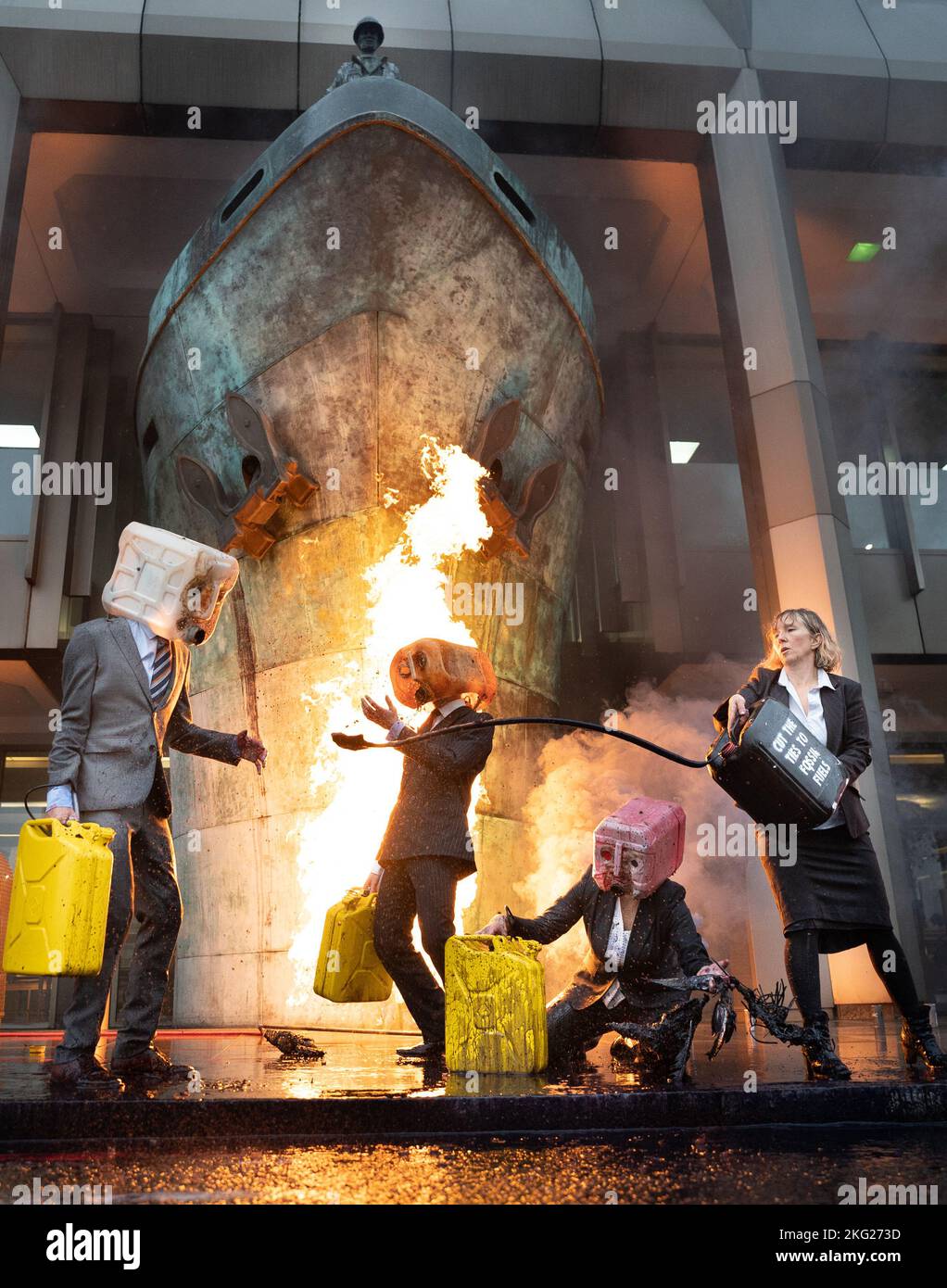 Ocean Rebellion activists demonstrate by vomiting fake oil and causing ...