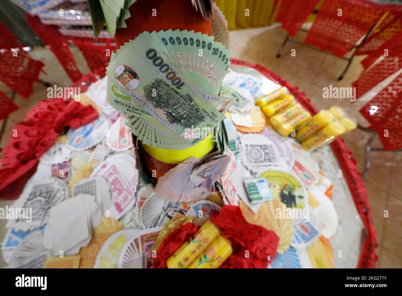 Phuoc Long buddhist temple. Burning hell bank notes and other forms of ...
