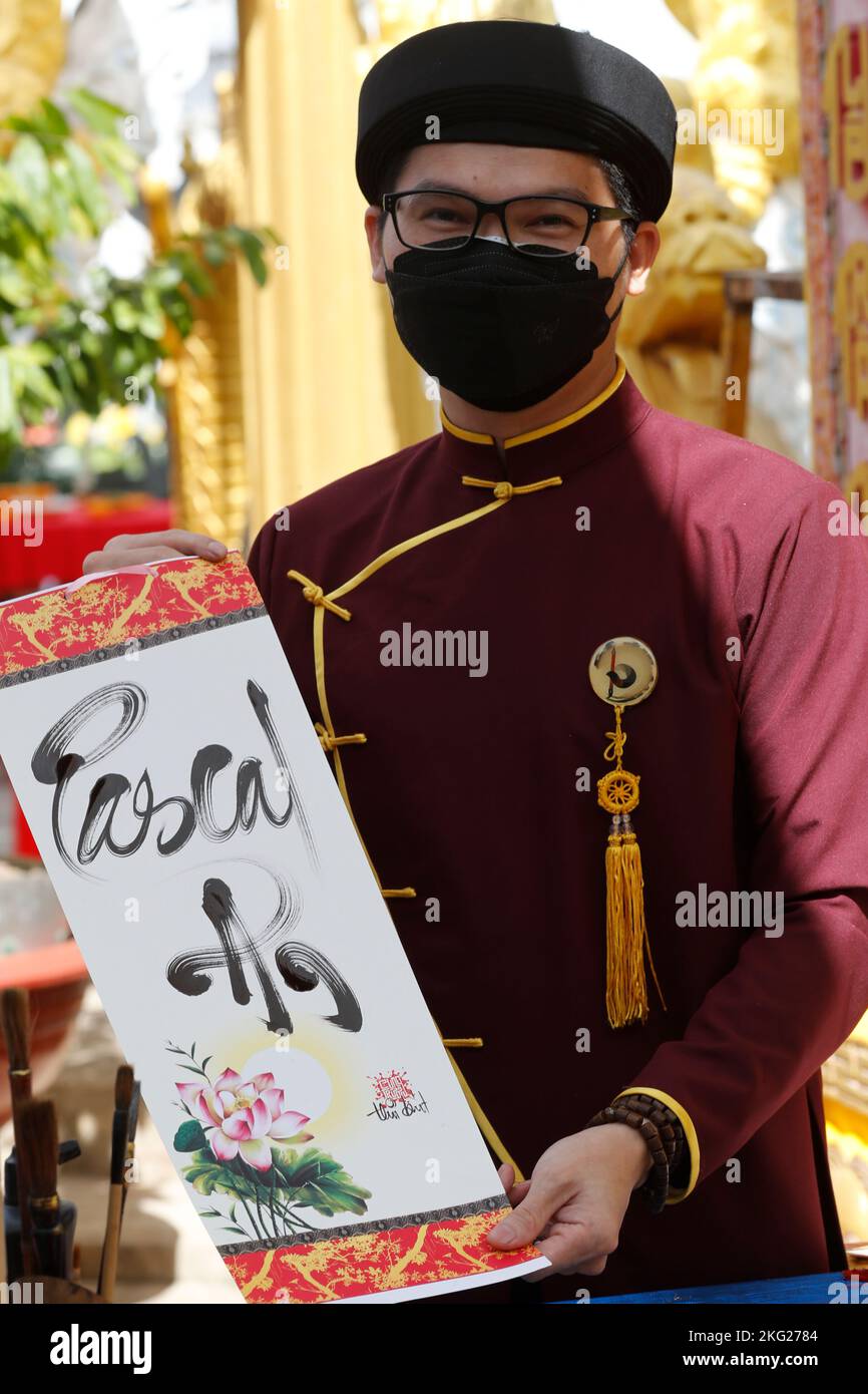Phuoc Long buddhist temple. Calligraphy with black ink and brush. Tan ...