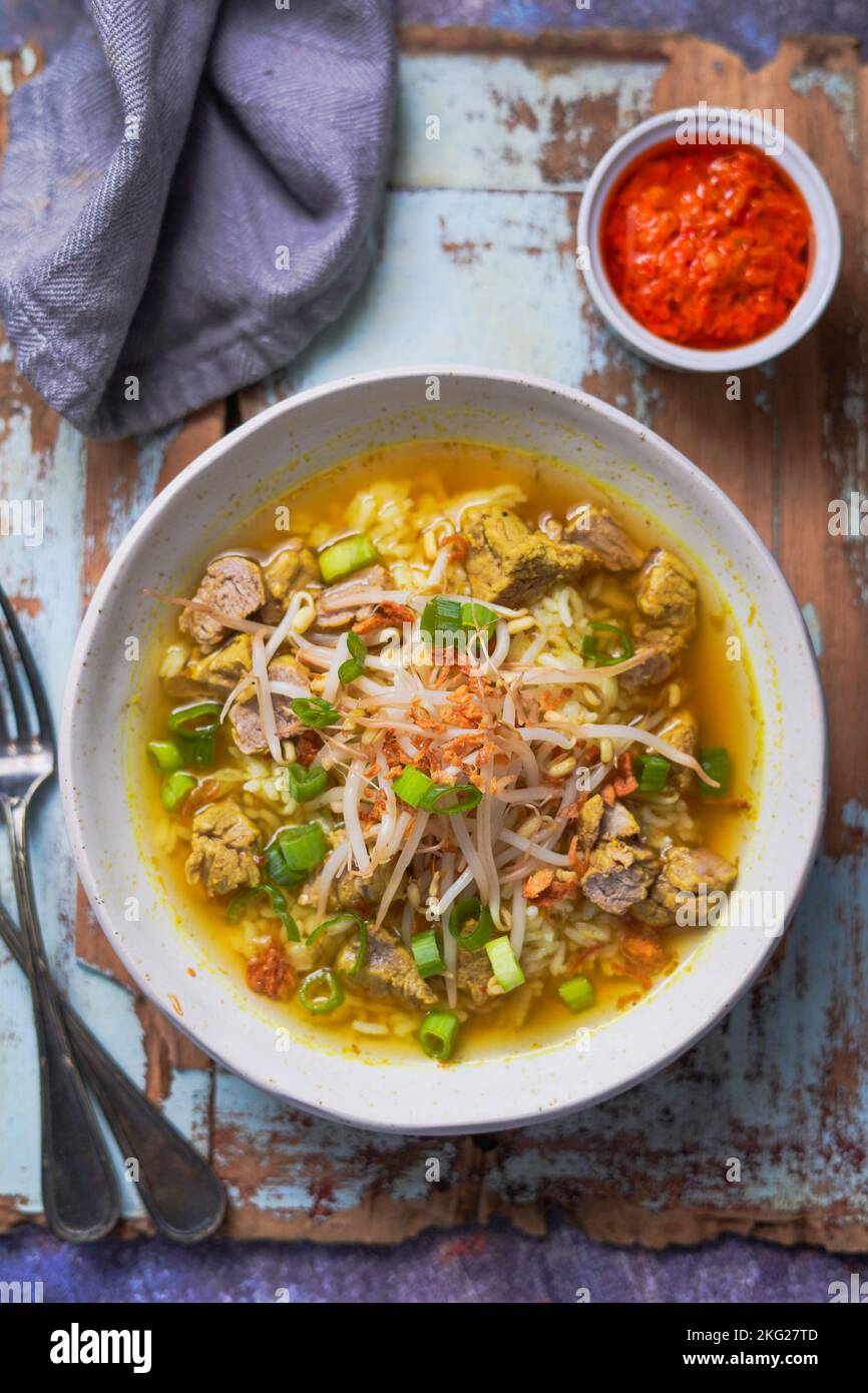 Soto Daging Is Indonesian Clear Soup Contains Of Beef Beansprout And Served With Sambal Stock