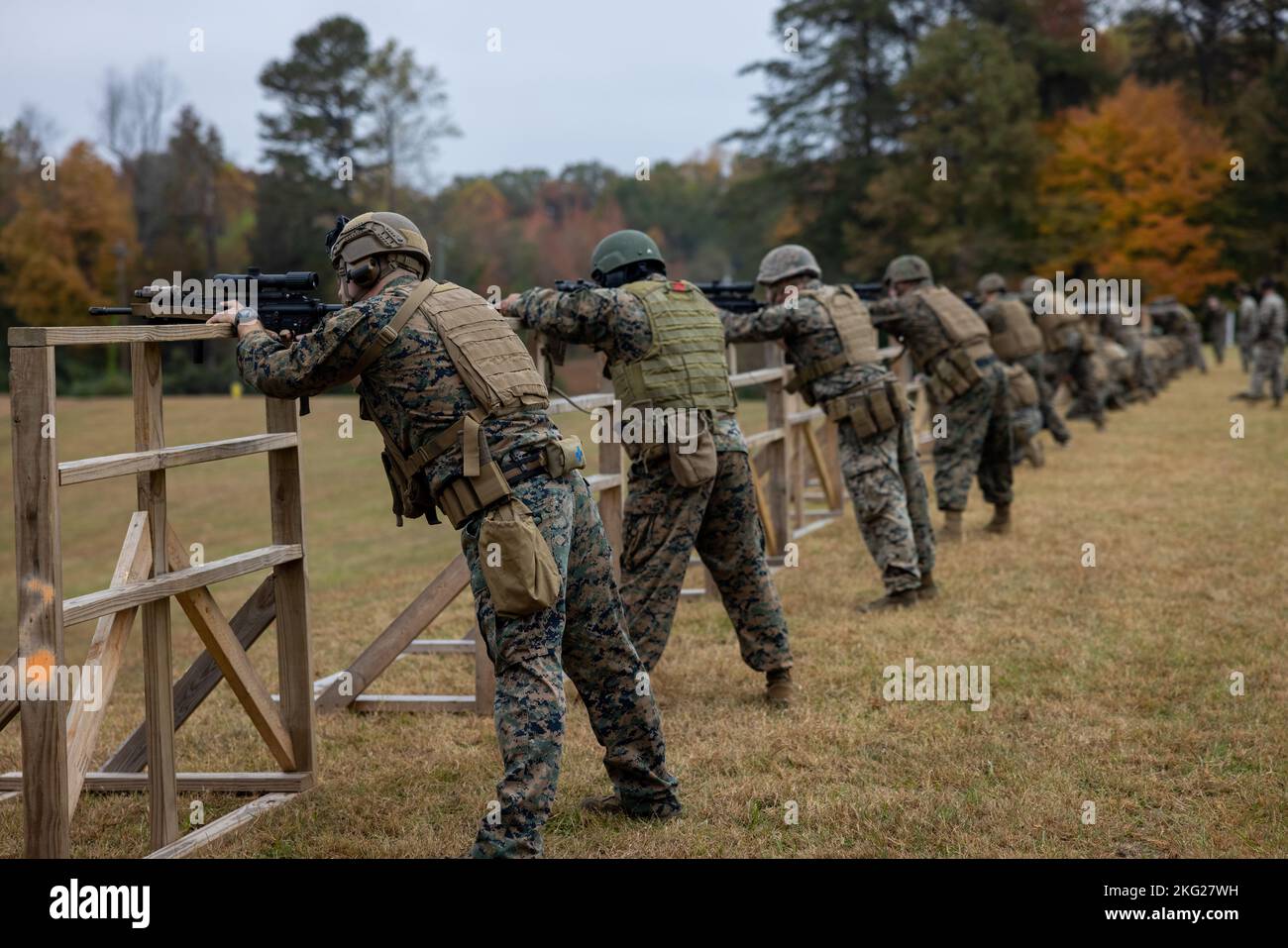 U.S. Marines with Marine Corps Shooting Team fire their rifles at a ...