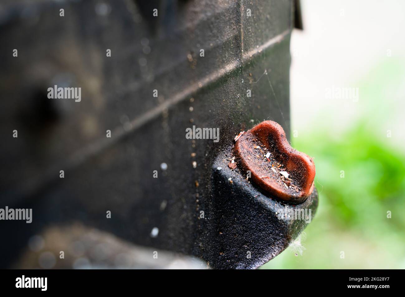 Filler hole for filling oil and dipstick for checking the oil level ...