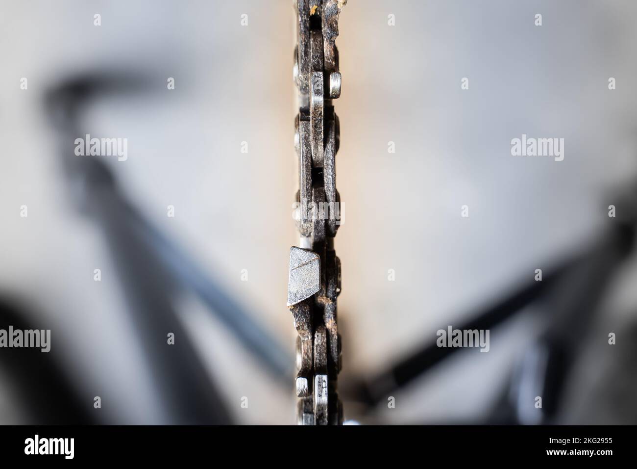 Chainsaw chain on the tire close-up. Saw teeth for cutting wood on a ...