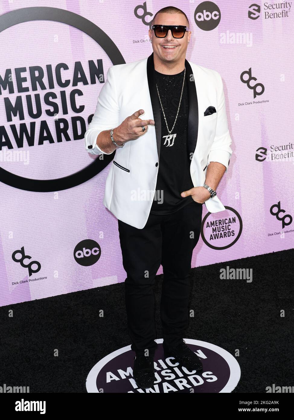 LOS ANGELES, CALIFORNIA, USA - NOVEMBER 20: Ricky J arrives at the 2022 ...