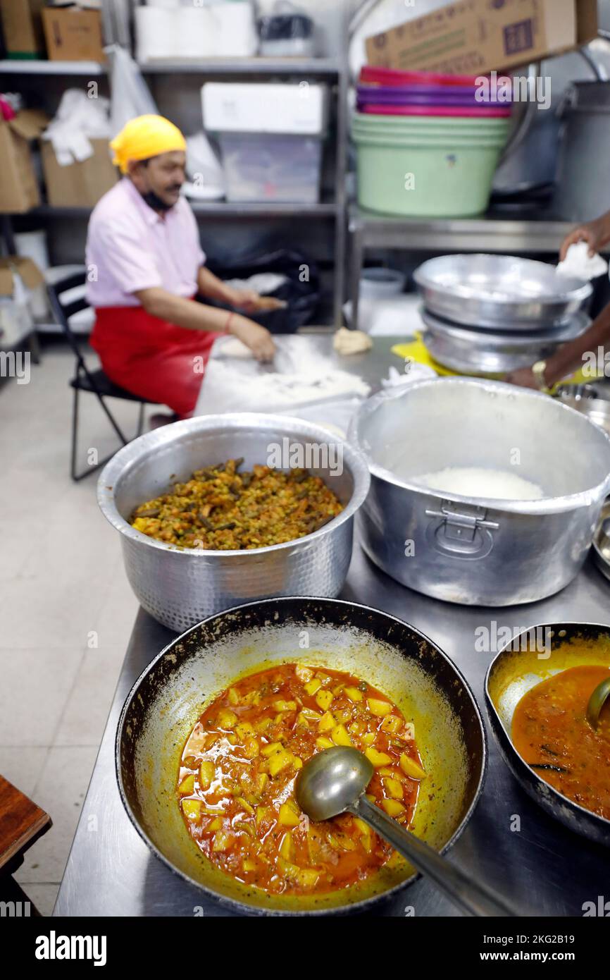 Shiva hindu temple. Man cooking vegetarian meal for lunch. Dubai ...