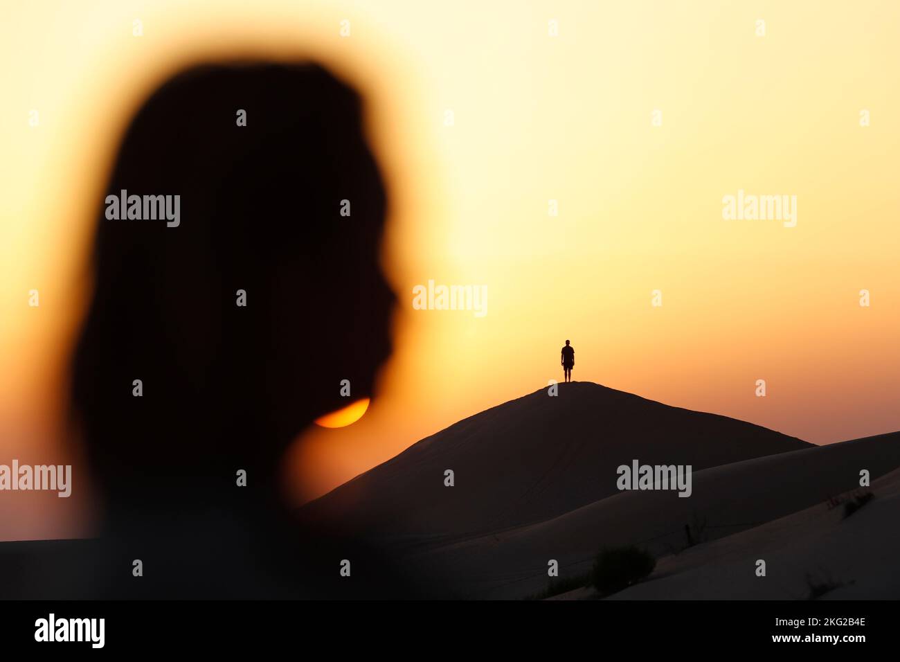 Sunset meditation in the desert. Concept for religion, faith, prayer ...