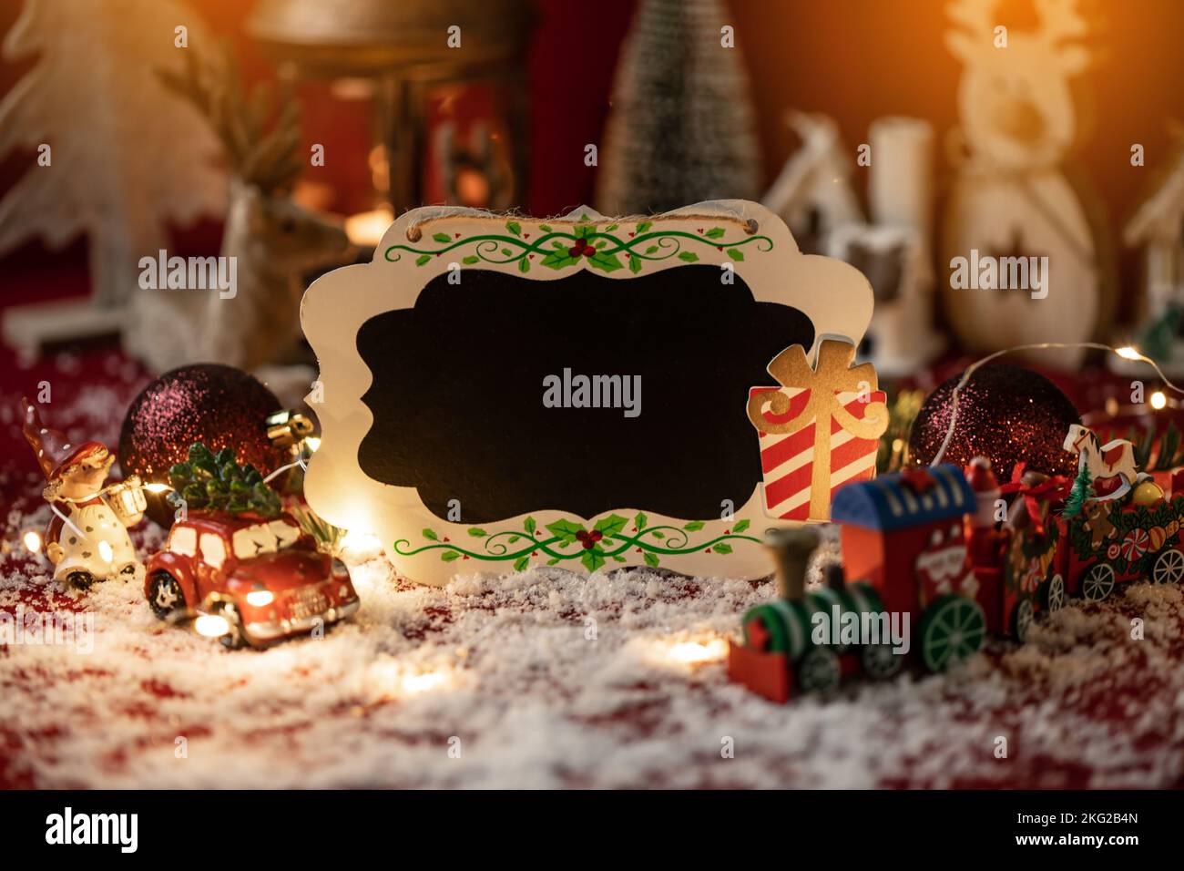 A Christmas blackboard with copy space surrounded by Christmas ...