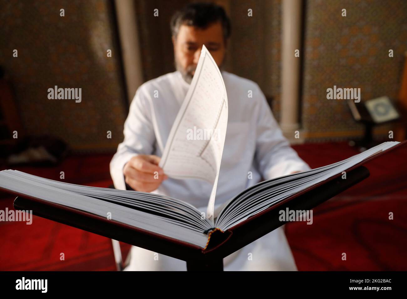 Geneva mosque. Imam reading the Quran. Switzerland Stock Photo - Alamy