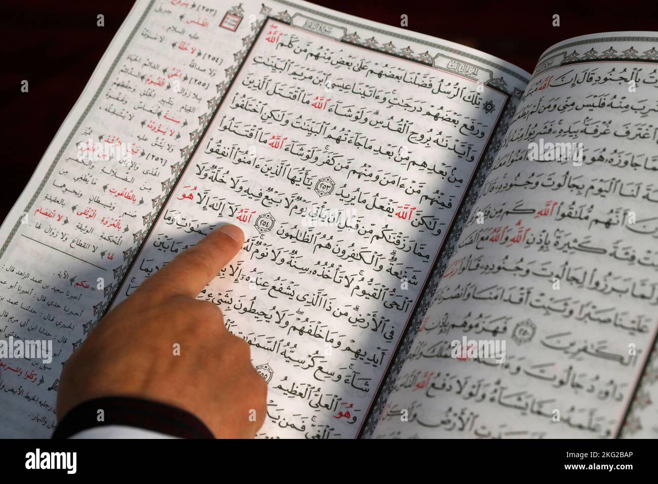 Muslim reading the Holy Quran in a mosque Stock Photo - Alamy