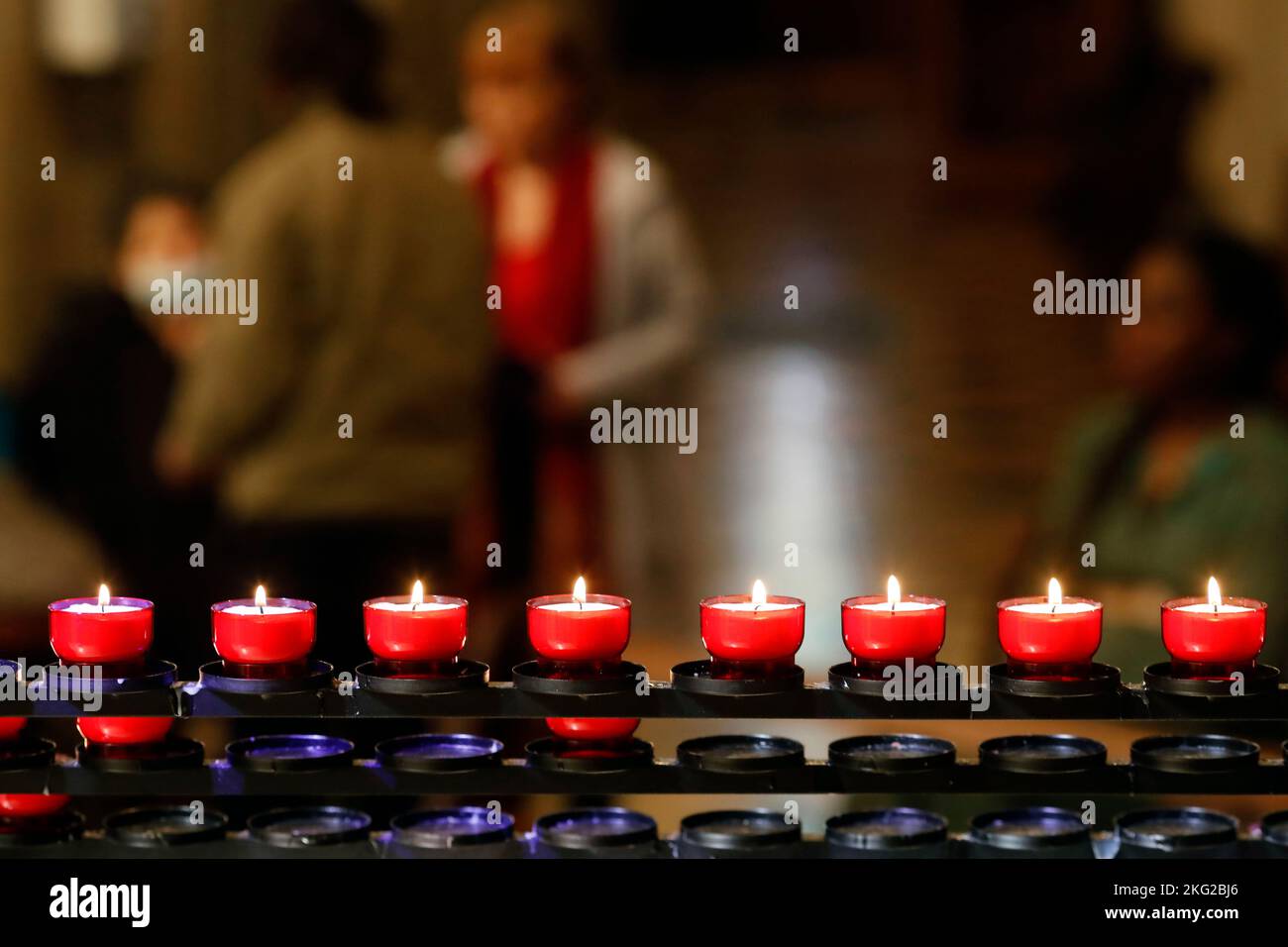 Red church candels. Symbol of faith. Switzerland Stock Photo - Alamy