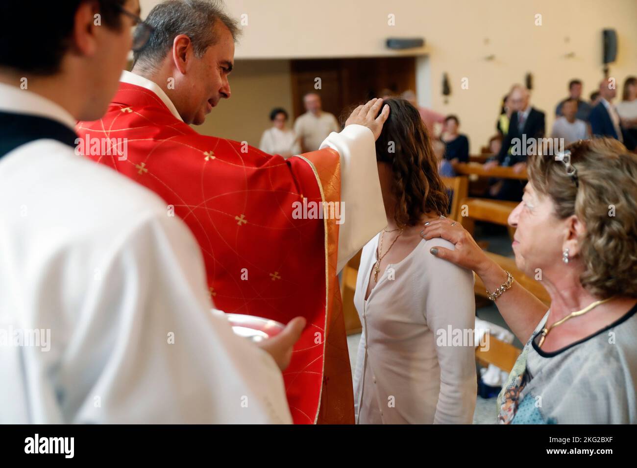 Roman catholic confirmation ceremony in church. Switzerland Stock Photo ...