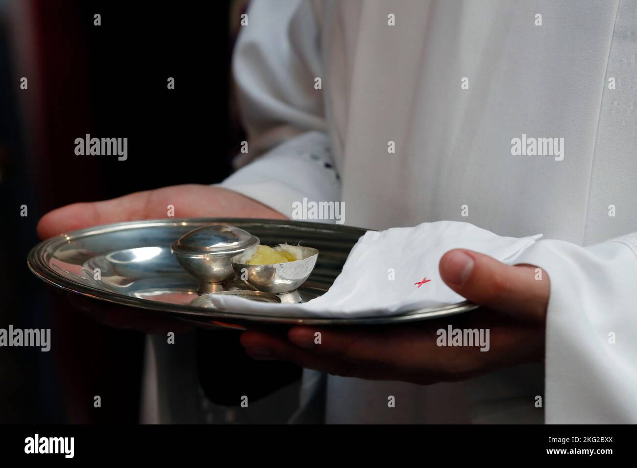 Roman catholic confirmation ceremony in church. Oil of Catechumens ...