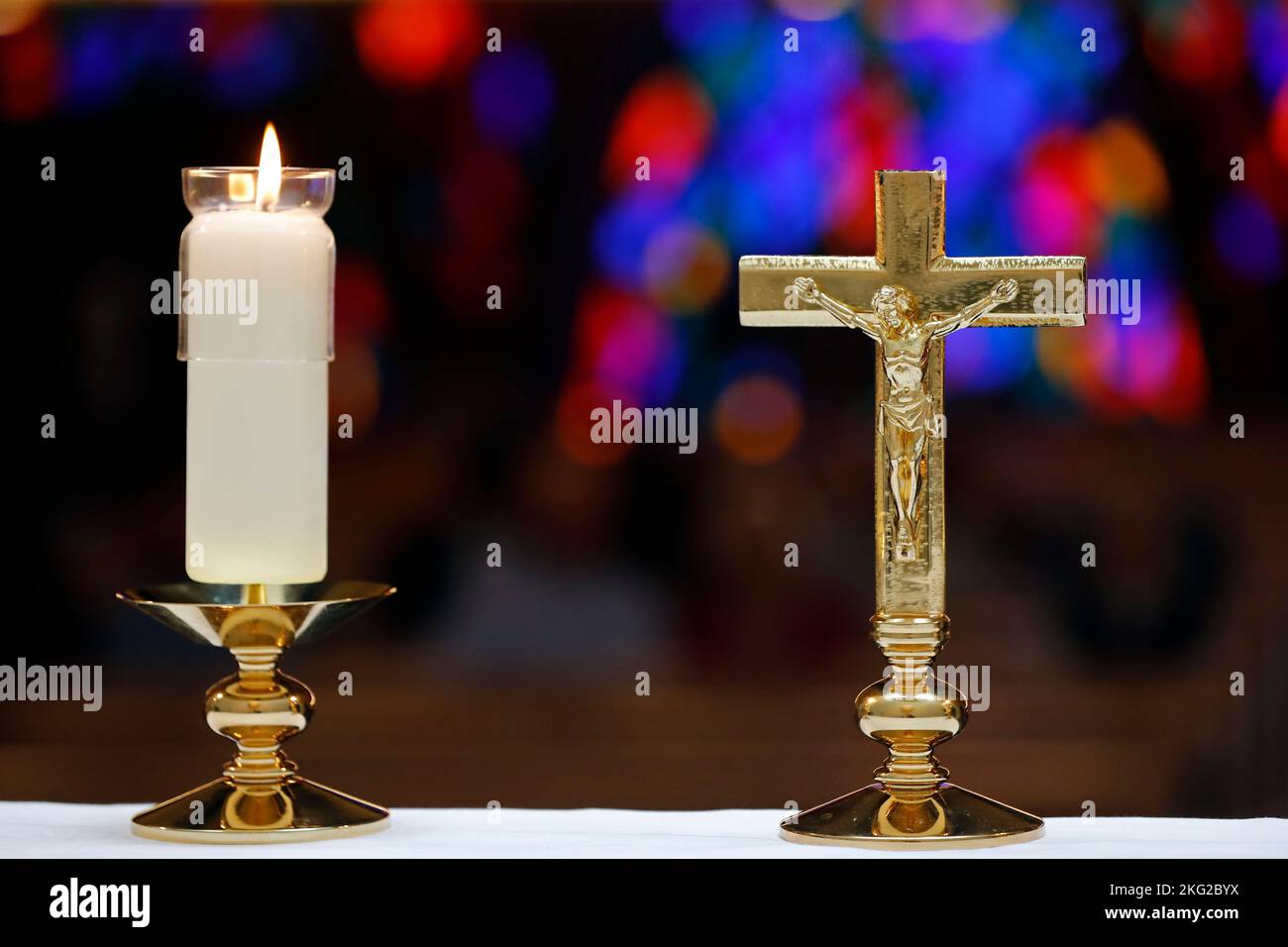 Catholic church. Church candel and crucifix on altar. Switzerland Stock ...