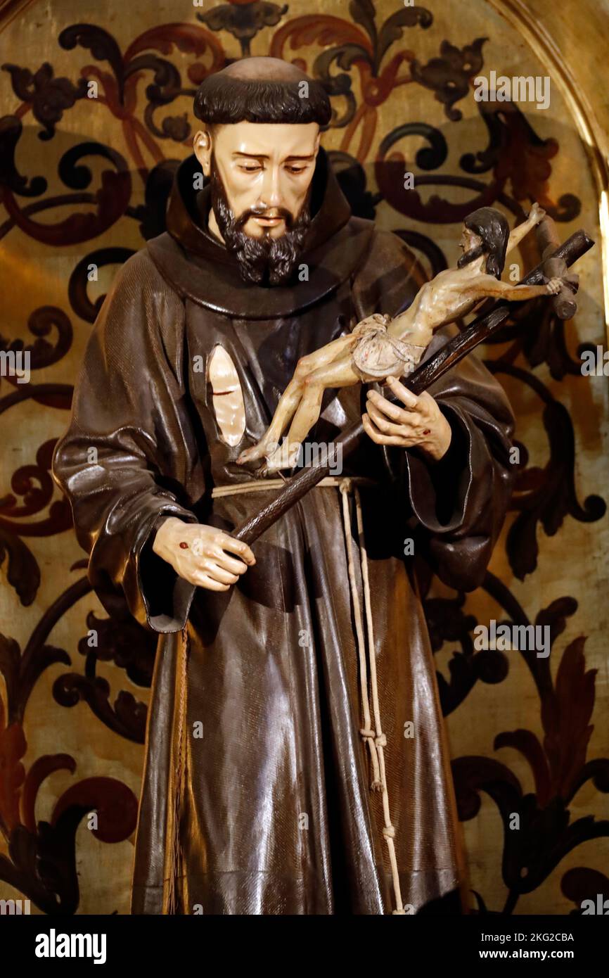 Malaga cathedraL. Saint Francis of Assisi with crucifix. Spain Stock ...