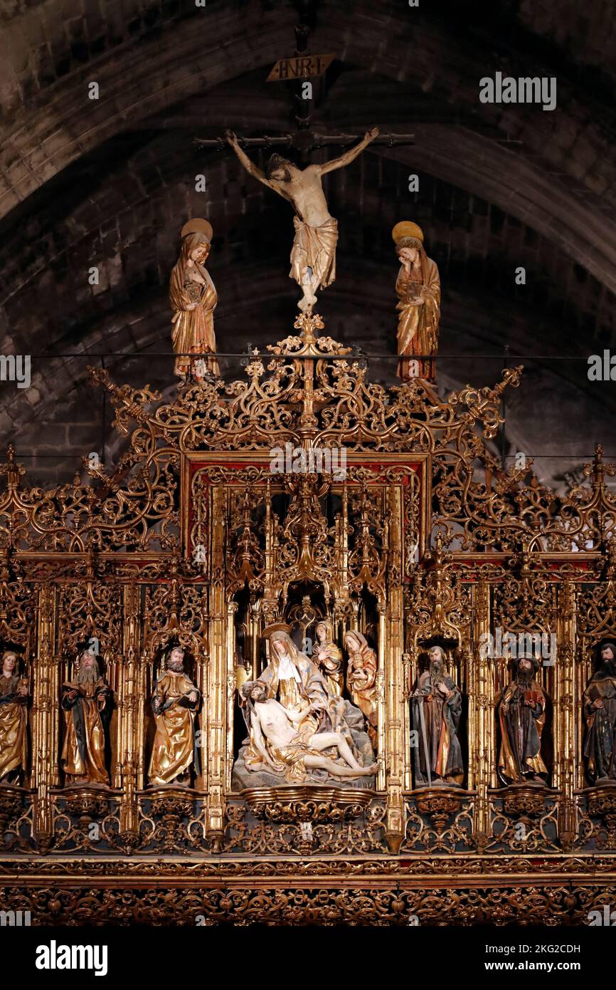 Seville Cathedral. Golden main altar with biblical figures. Spain Stock Photo - Alamy