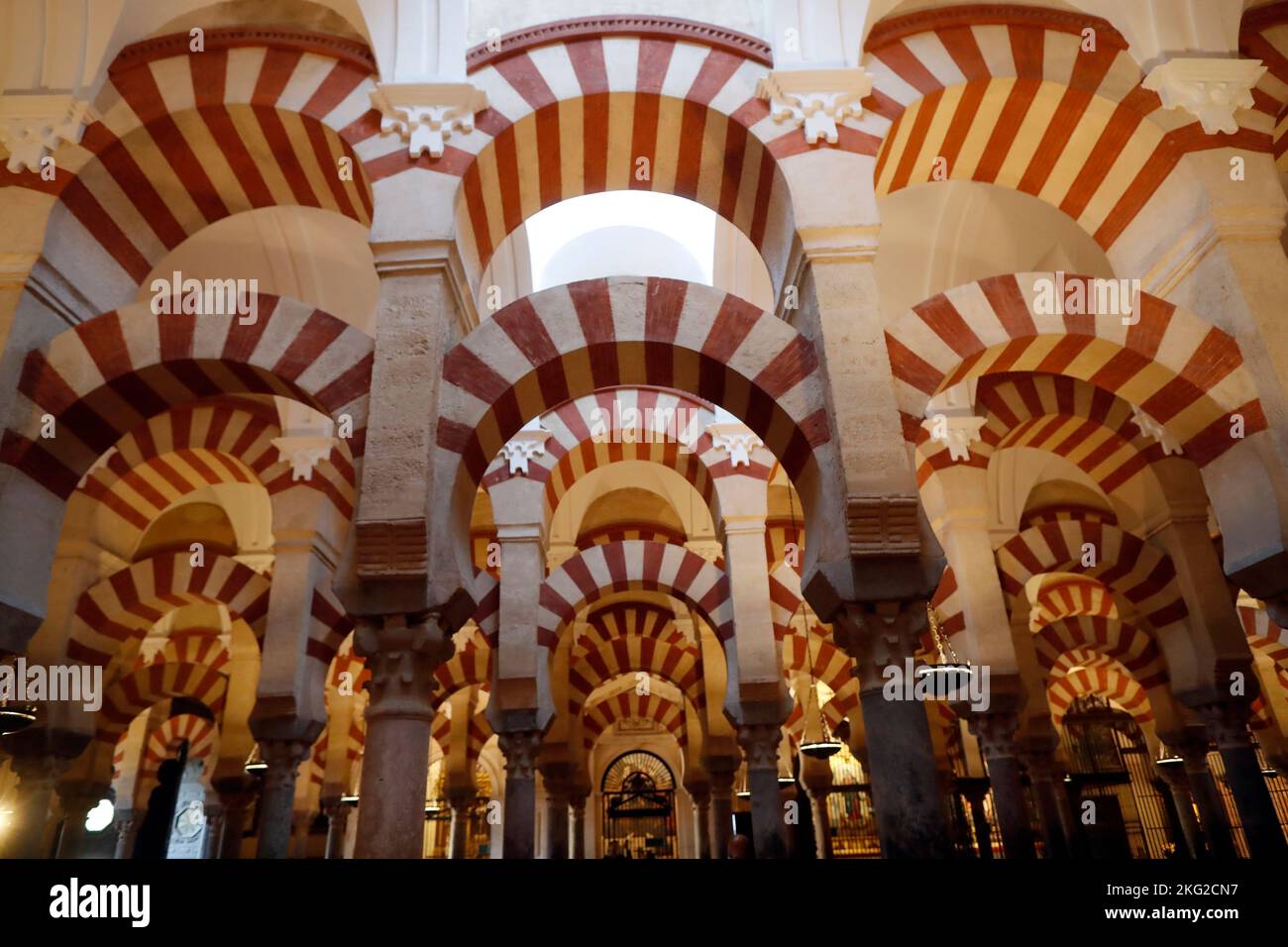 Mosque Cathedral of Cordoba. Interior of the Mezquita with red and ...