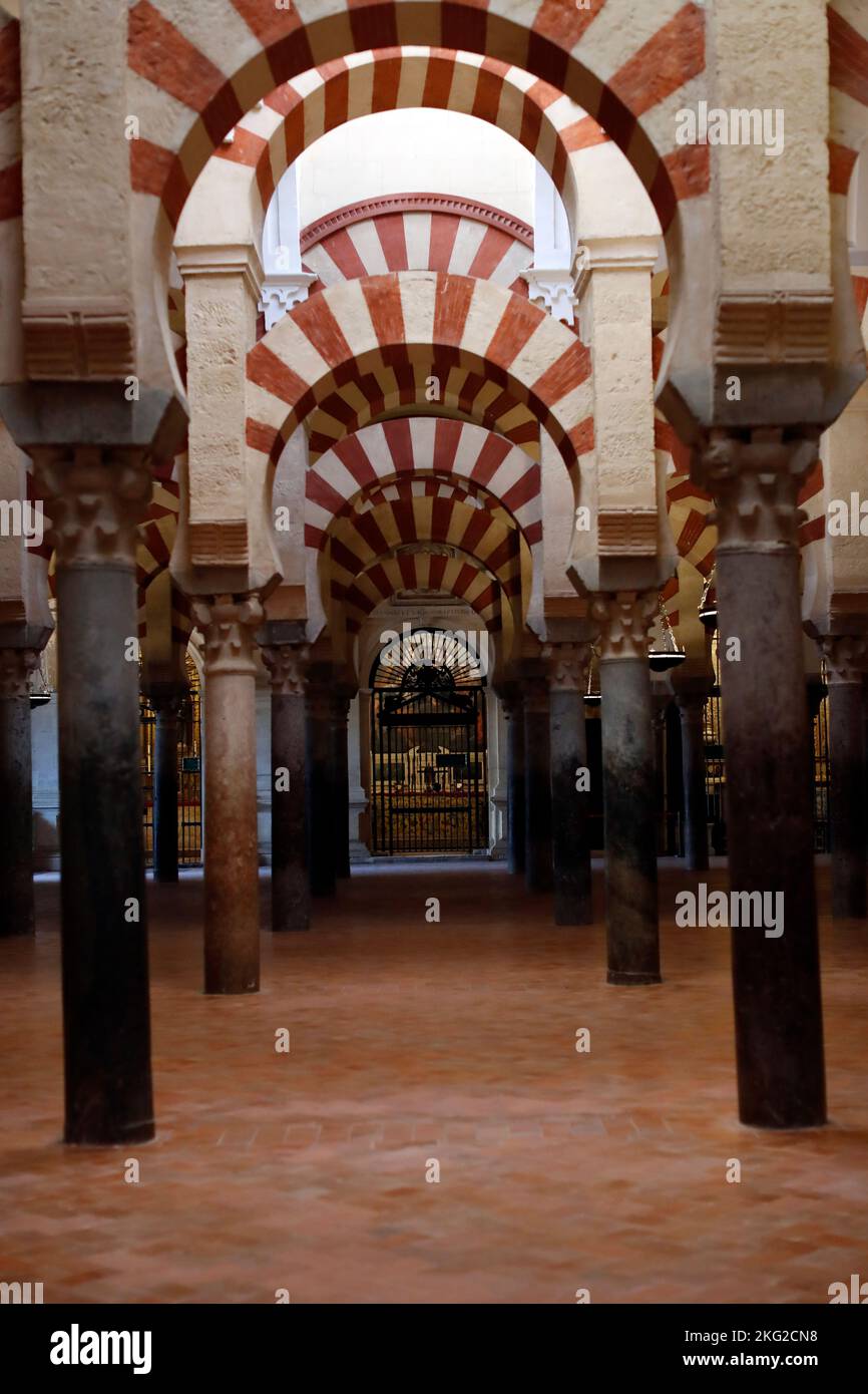 Mosque Cathedral of Cordoba. Interior of the Mezquita with red and ...