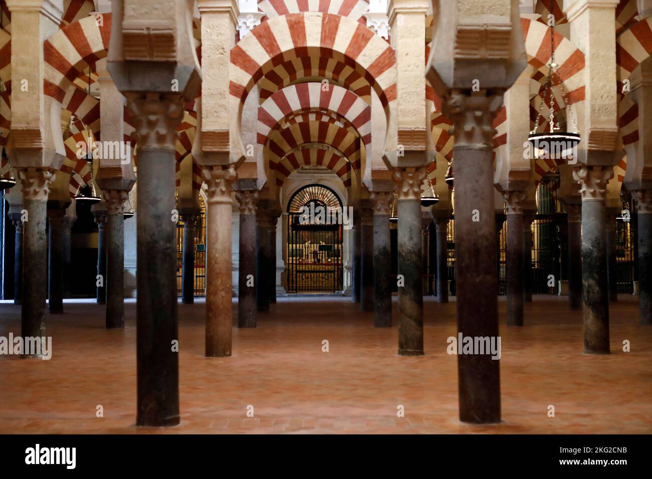 Mosque Cathedral of Cordoba. Interior of the Mezquita with red and ...