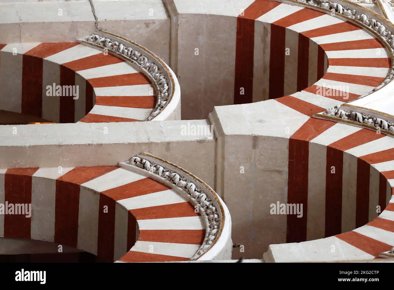 Mosque Cathedral of Cordoba. Interior of the Mezquita with red and ...