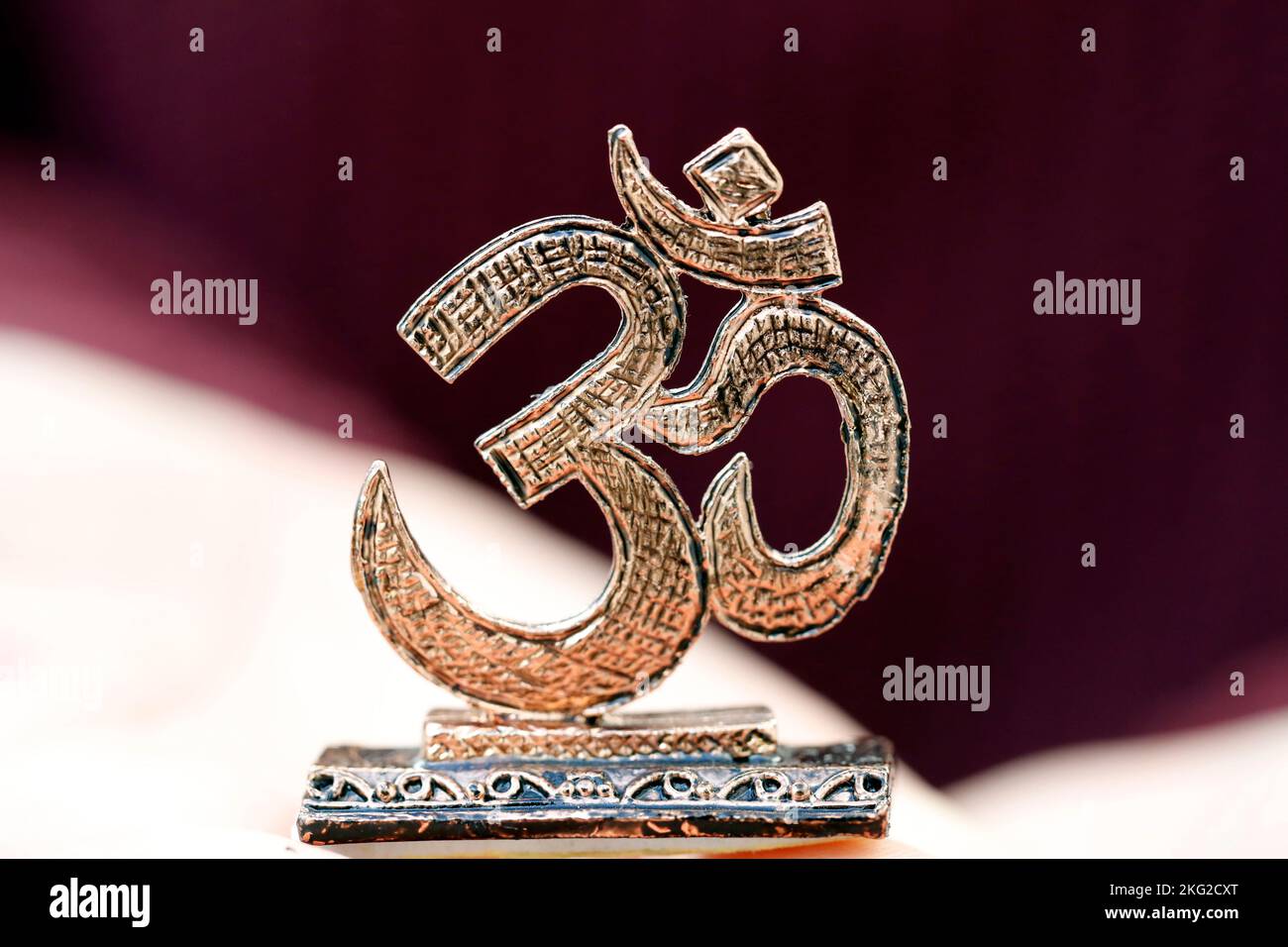 Aum (also Om or Ohm) is a mystical or sacred syllable in the Hindu ...