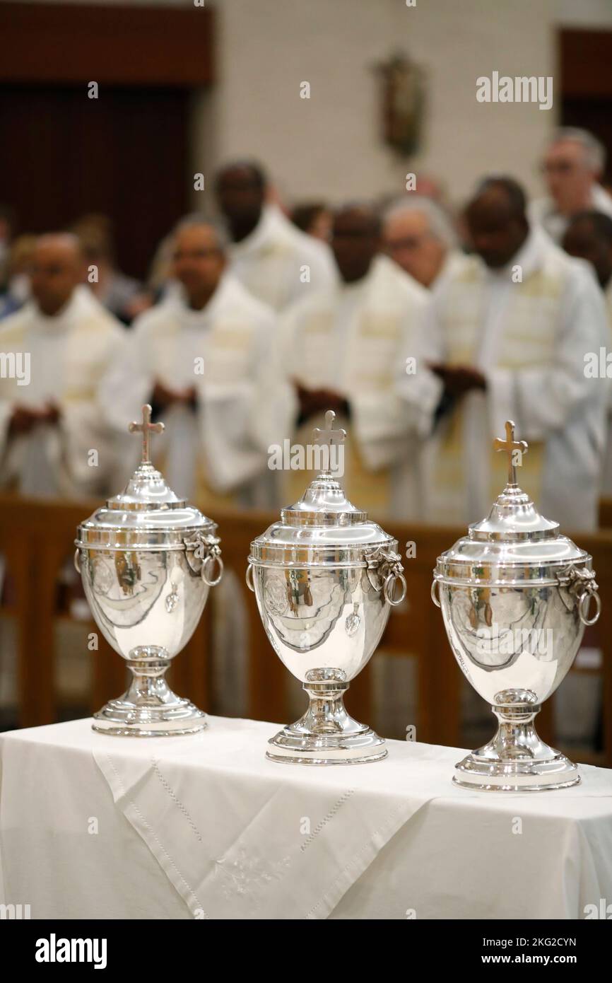 Saint Julien en Genevois church. Holy Thursday. Chrism Mass. Holy oils ...