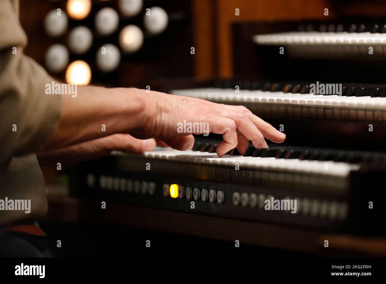 Organ player in a catholic church. Sunday mass. France Stock Photo - Alamy