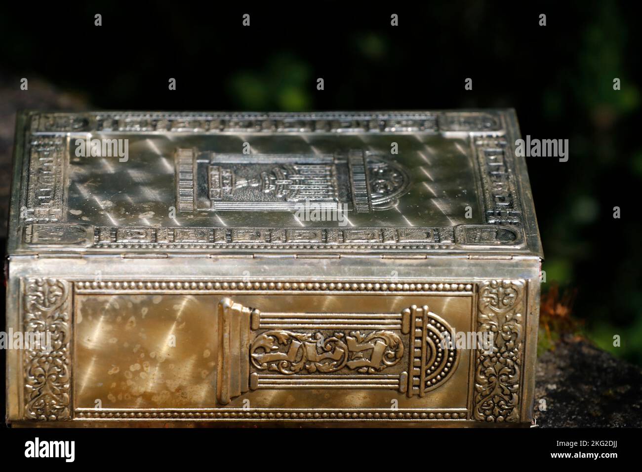 Old Torah book with the the five books of Moses. Cover with a menorah ...