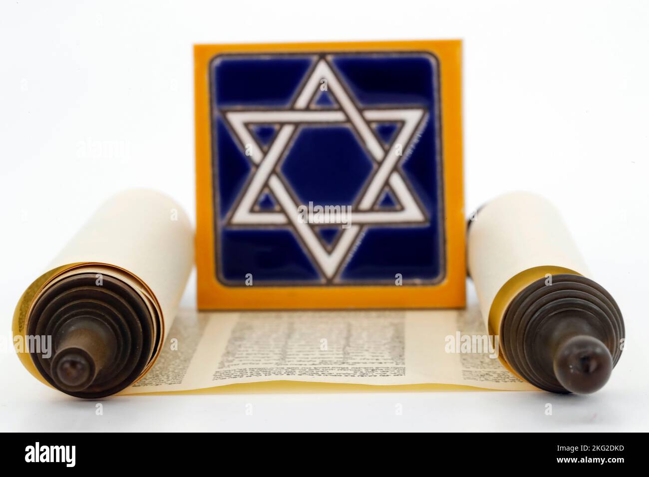 Star of David and small Torah scrolls. Symbol of Jewish identity and ...