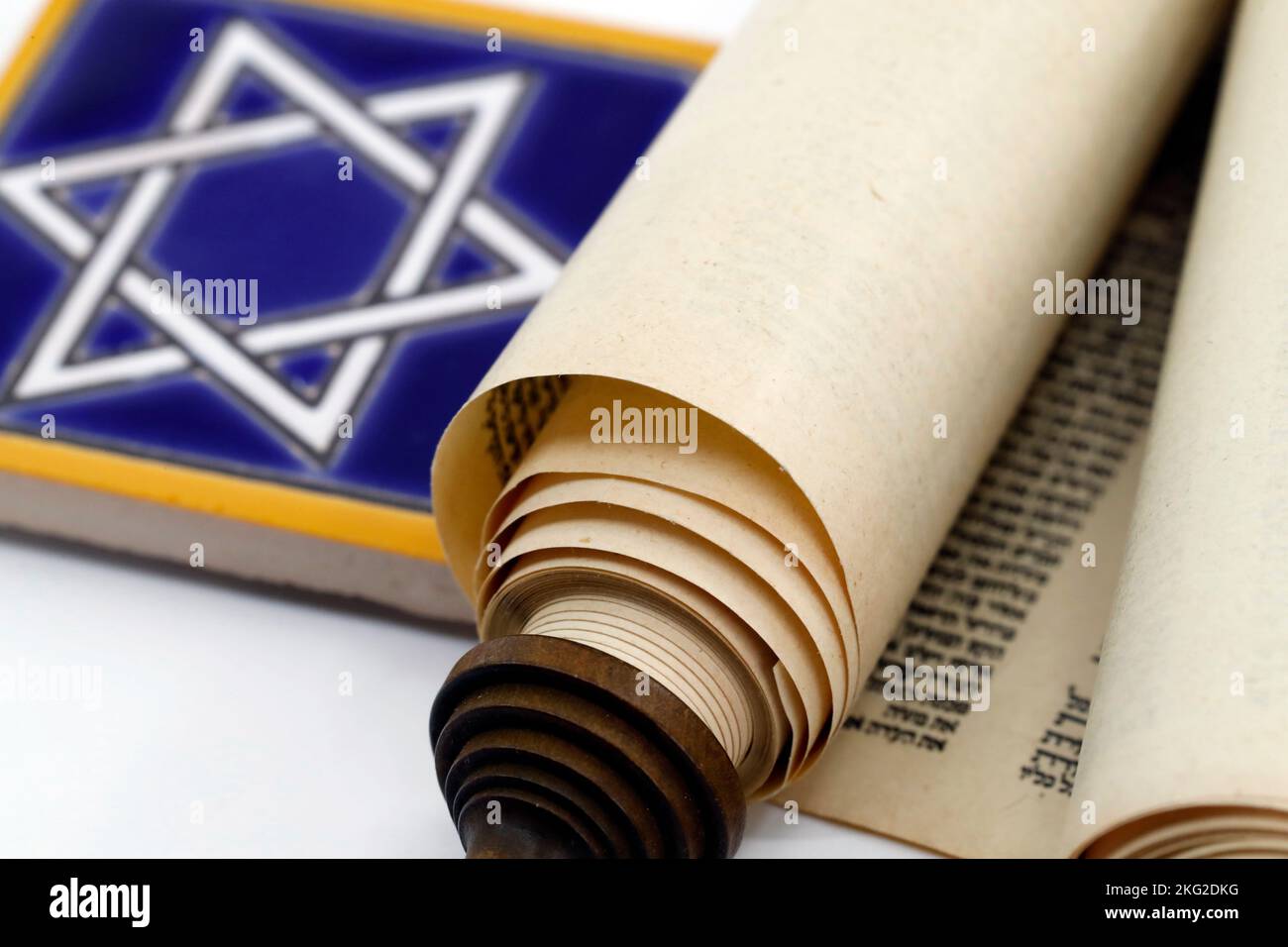 Star of David and small Torah scrolls. Symbol of Jewish identity and ...