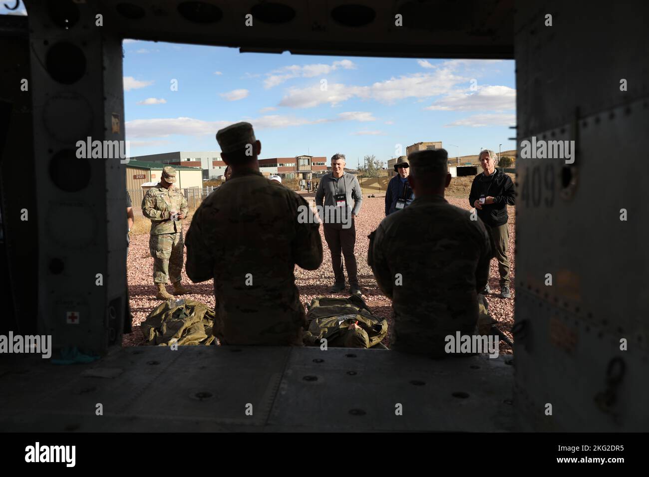 Soldiers brief a group of civilians on medical training during the ...