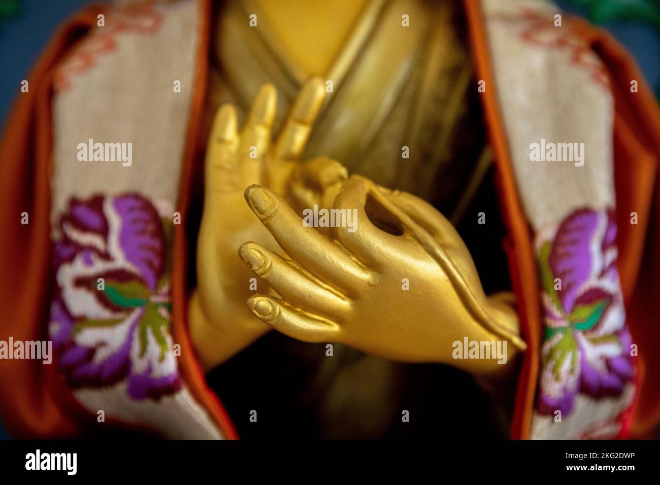 Detail of a statue in a buddhist temple in western France Stock Photo ...