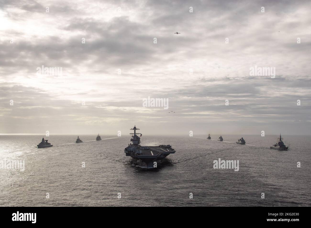Aircraft attached to Carrier Air Wing (CVW) 8 fly over the first-in ...