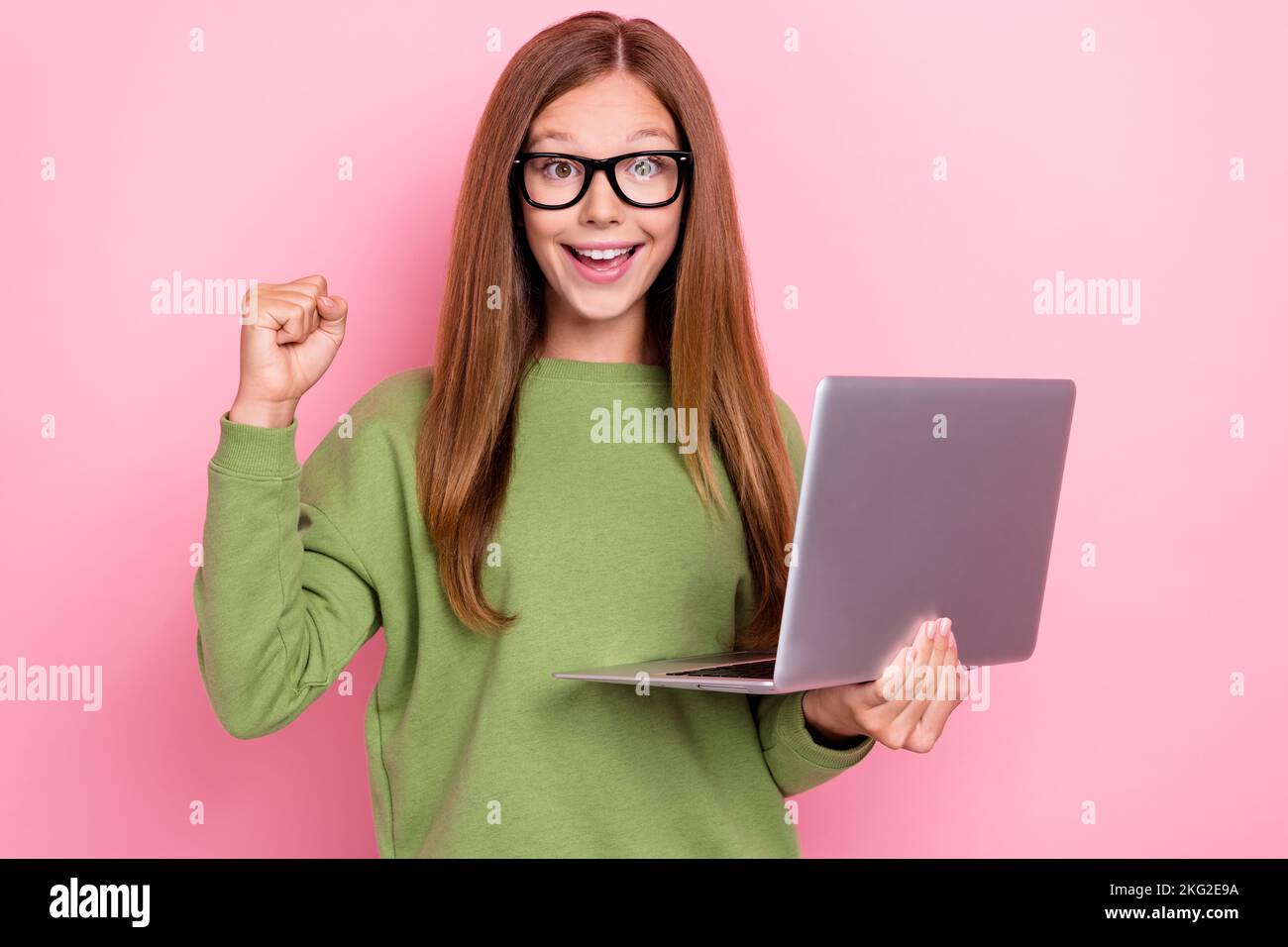Portrait of impressed ecstatic girl long hairstyle dressed green ...