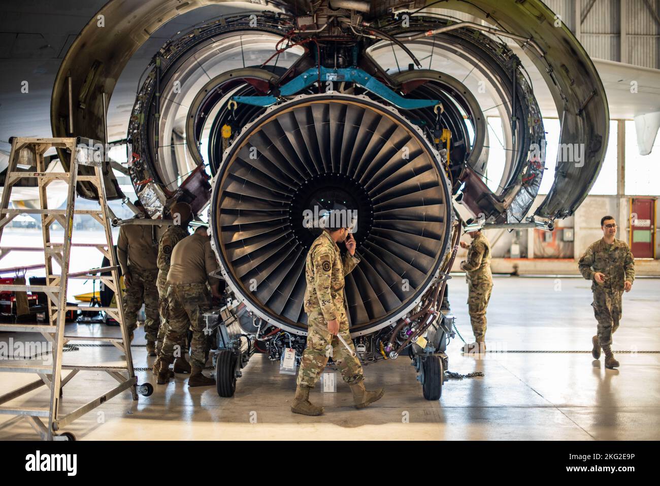 U.S. Airmen with the 660th Aircraft Maintenance Squadron swap an engine ...