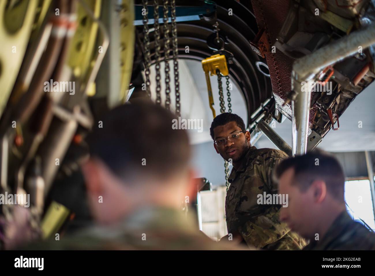 U.S. Air Force Senior Airman Antonio Nocentelli, center, 660th Aircraft ...
