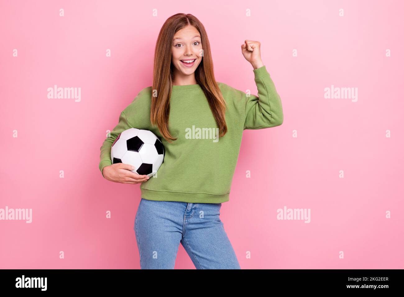 Photo of pretty lucky school girl dressed green sweatshirt holding ...