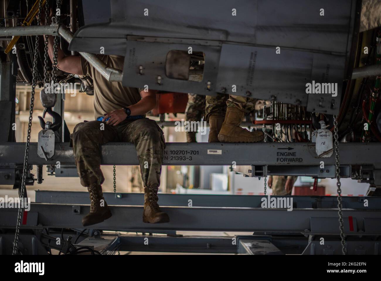 U.S. Airmen with the 660th Aircraft Maintenance Squadron swap an engine ...