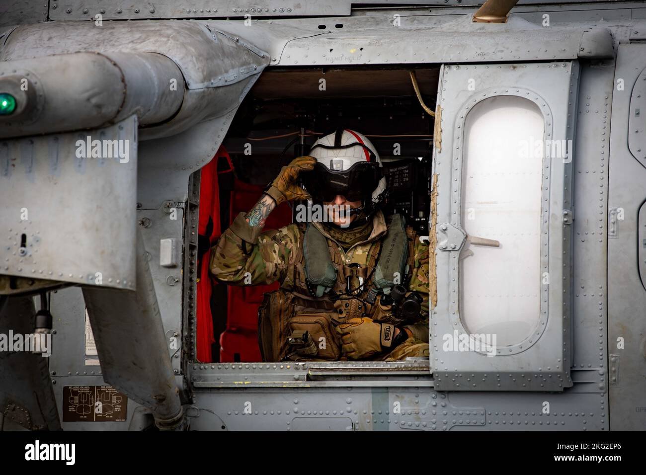 Naval Air Crewman 1st Class Bobby Nilson, assigned to the “Tridents” of ...
