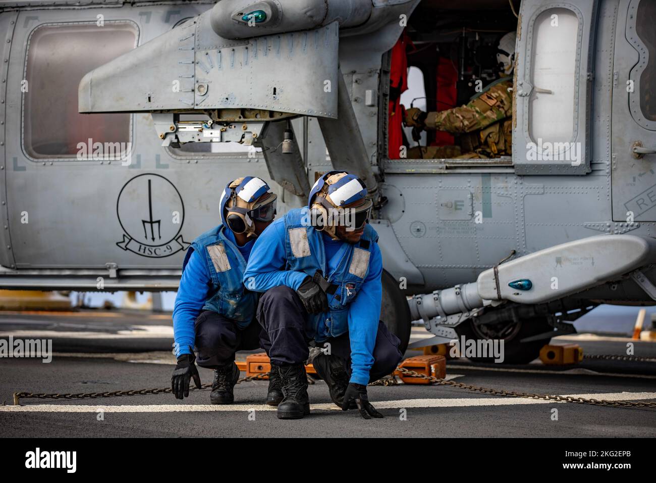 Boatswain’s Mate Seaman Kesean Blair, right, and Seaman Joshua Whitaker ...