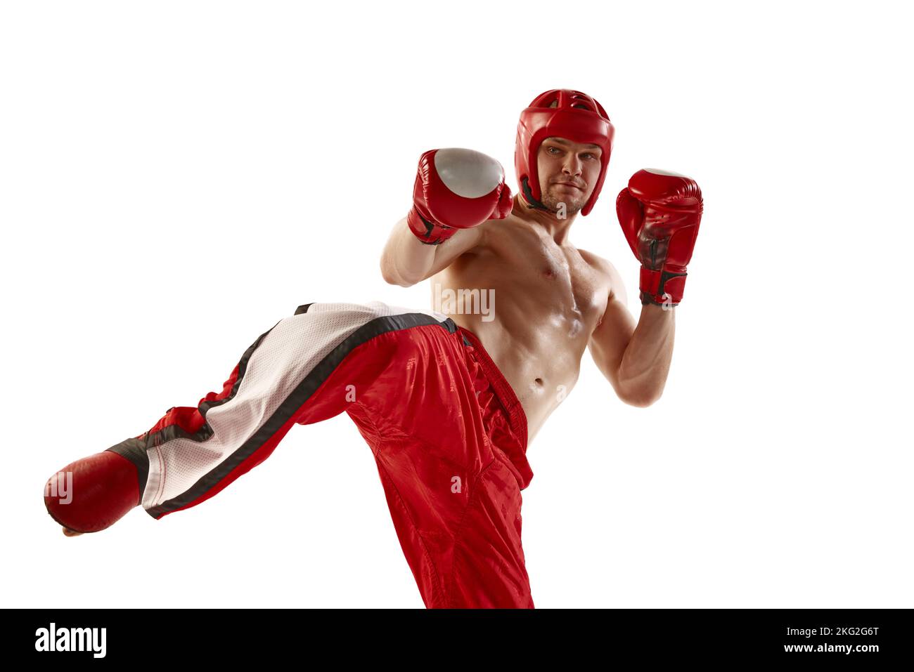 Dynamic portrait of young muscled athlete, professional kickboxer in ...